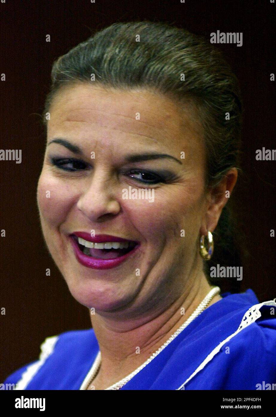 Assistant district attorney Freda Black smiles during a press ...