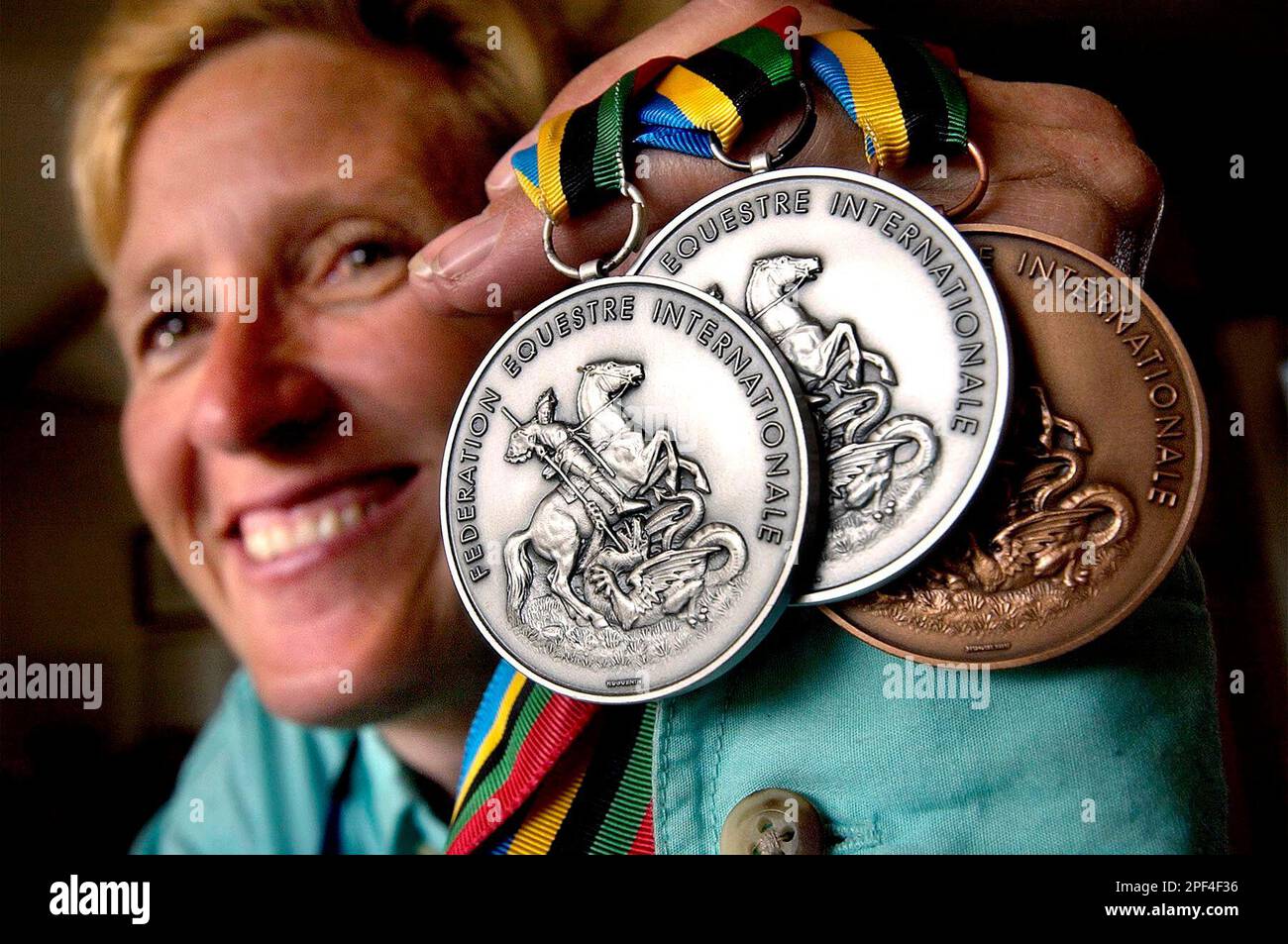 Suzanne Hayes displays some of her medals, Sept. 30, 2003, near Ovando ...