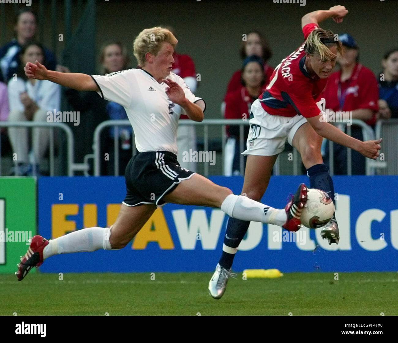 Germany's Kerstin Stegemann, left, blocks a cross by the United States ...