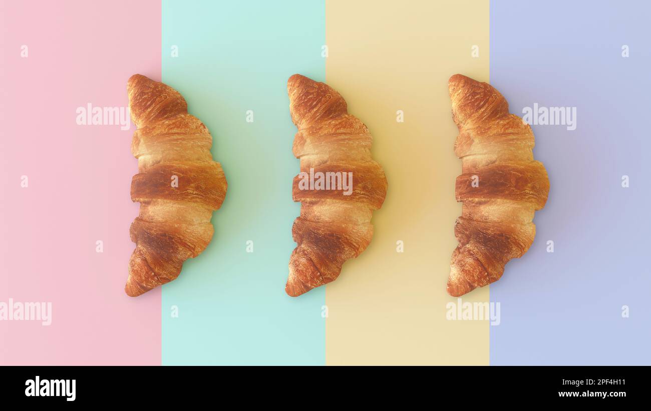 Three ruddy French croissants top view. Crispy dessert on a pastel ...