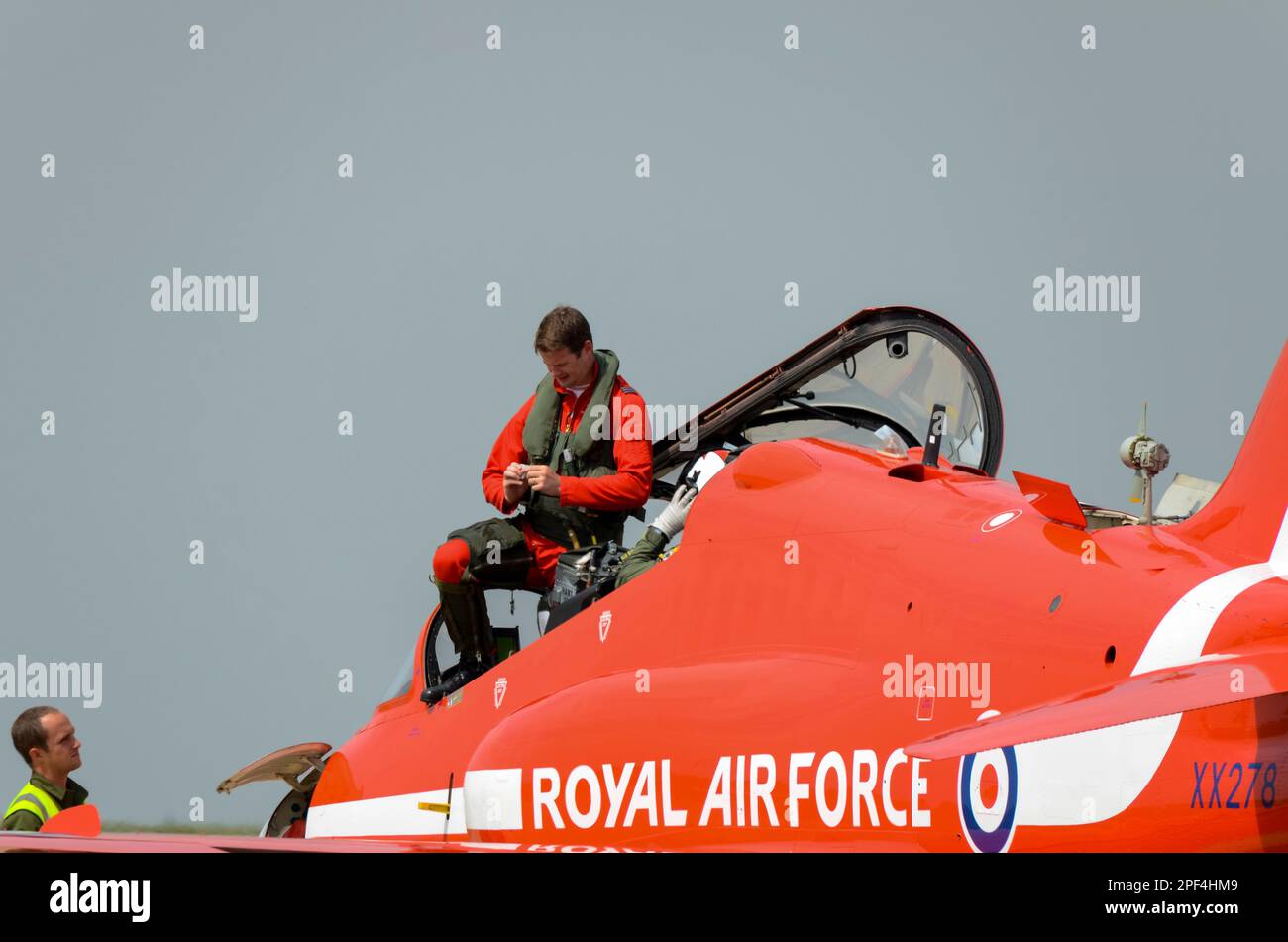 Royal Air Force Red Arrows display team leader, Red 1, Sqn Ldr Jim Turner leaving cockpit of a ...