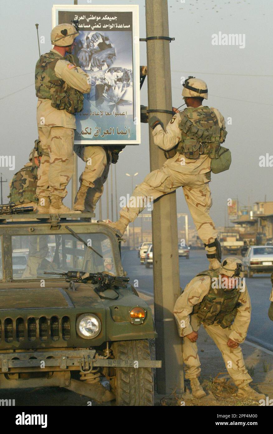 U.S. Army's 101st Airborne Division soldiers hung up a panel at a ...