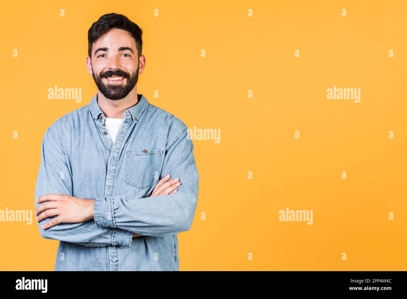 medium shot smiley guy crossed arms. High resolution photo Stock Photo ...