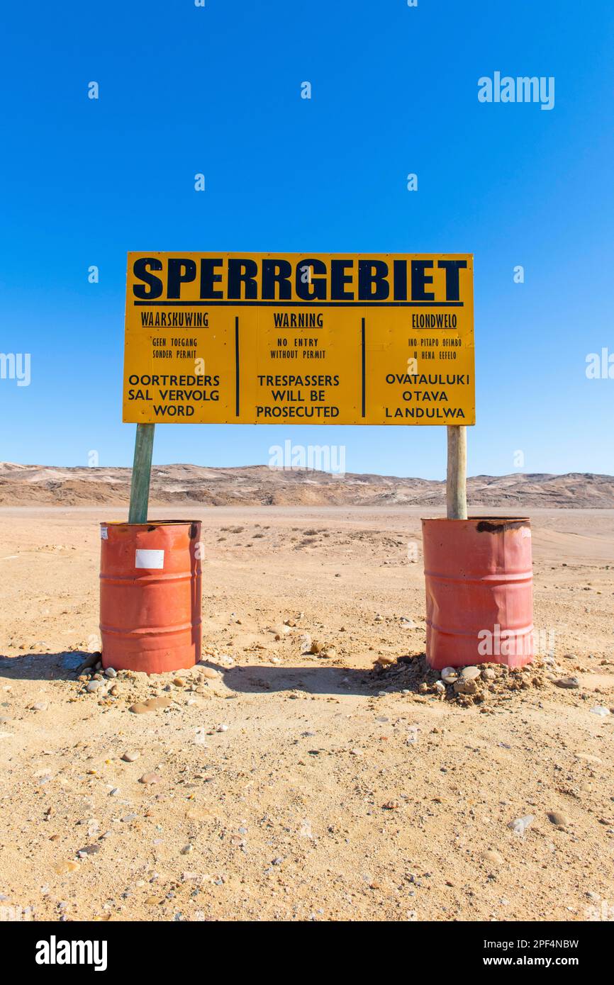 Warning sign at the diamond exclusion zone in the Sperrgebiet National ...