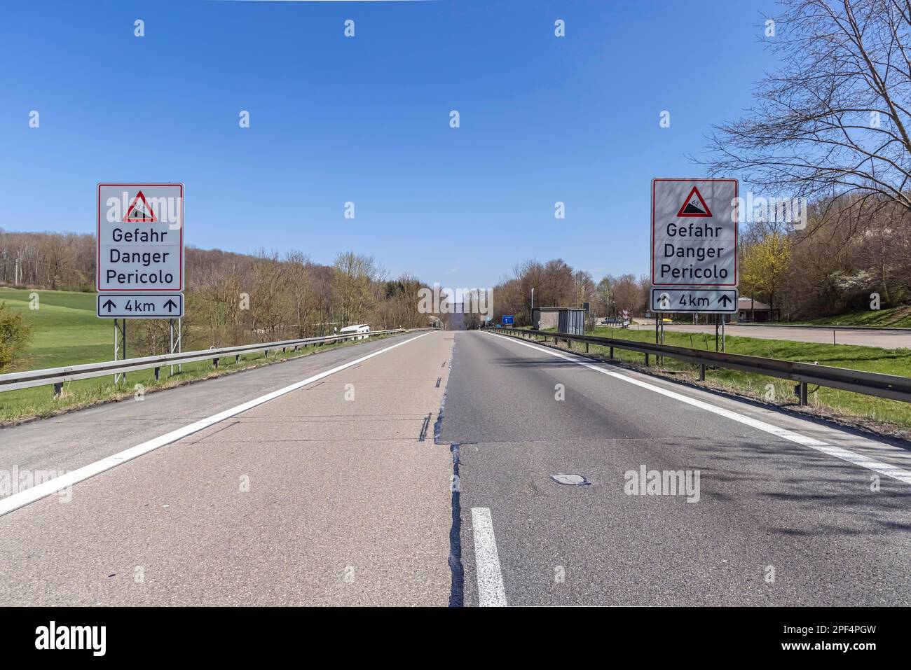 A8 motorway, dangerous gradient. The directional lanes across the ...