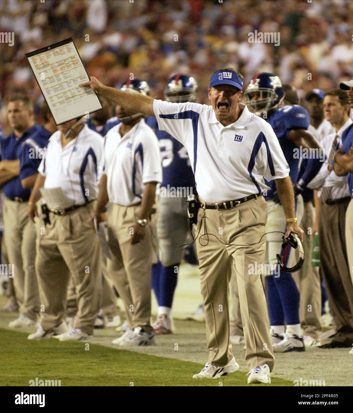 New York Giants coach Jim Fassel yells during the fourth quarter ...