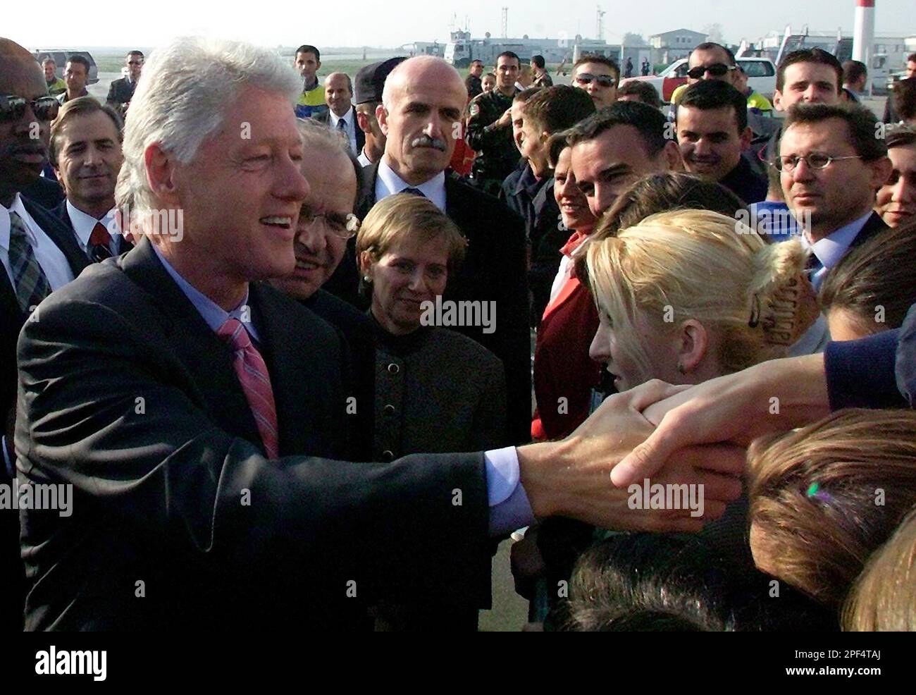 Former U.S President Bill Clinton, left, joined by Kosovo's President ...
