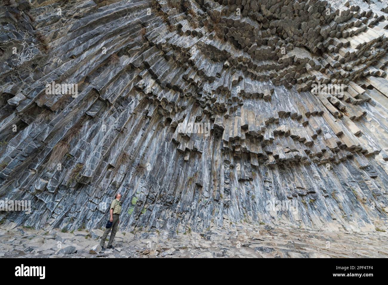 Symphony of Stones, Man under Basalt Column Formation along Garni Gorge ...