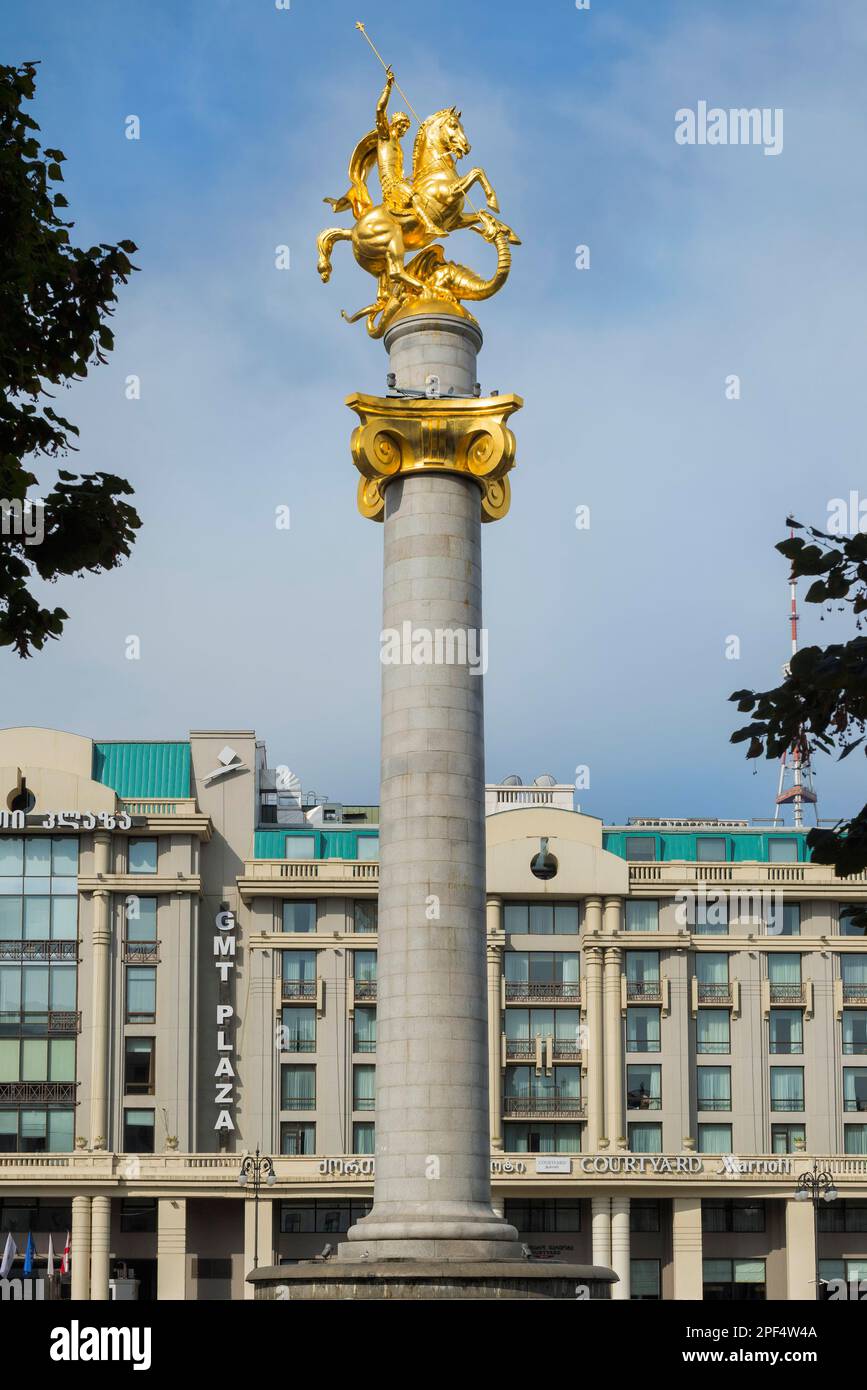 Freedom Square and golden statue of St. George fighting the dragon ...