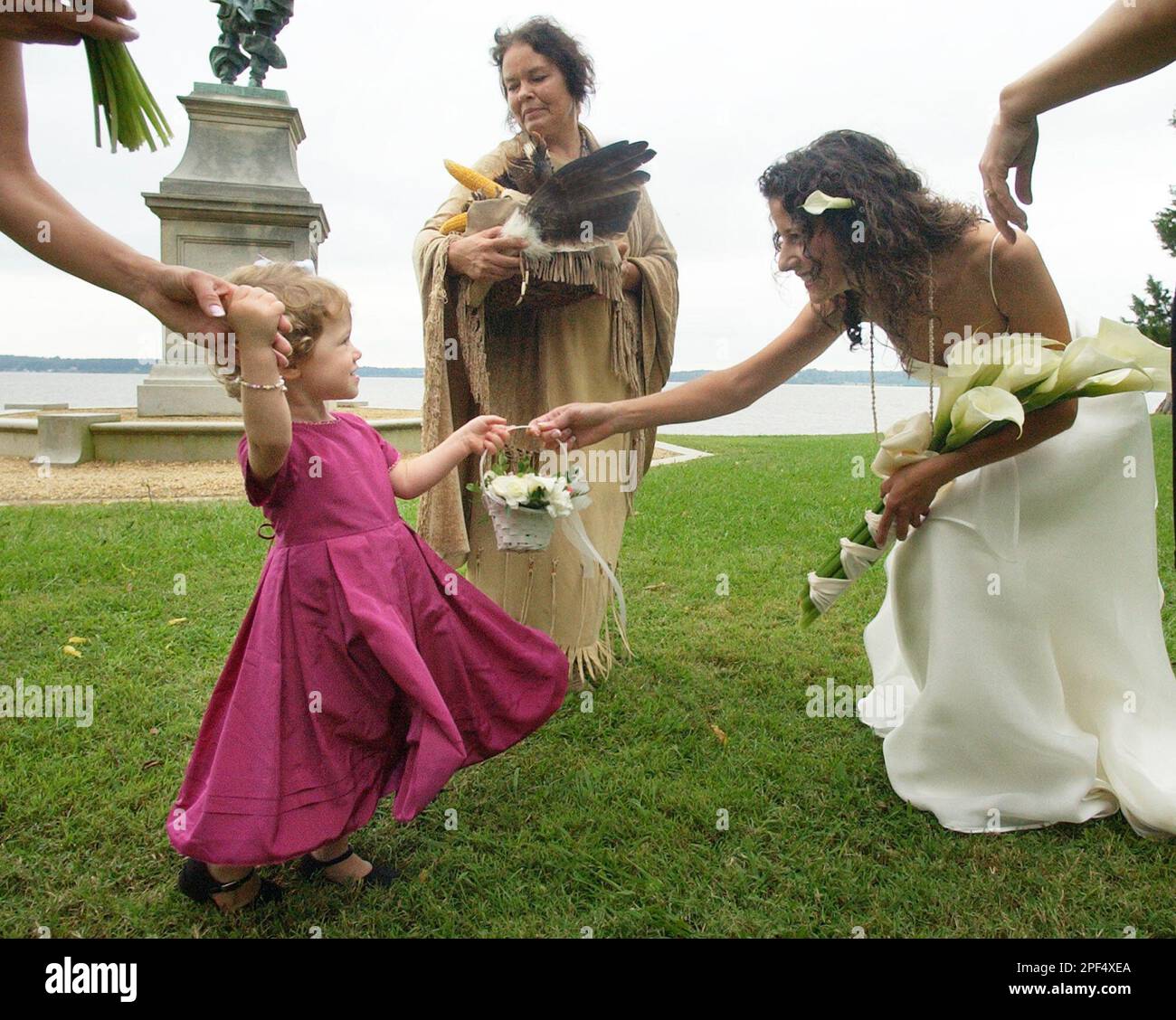 Amy Lynn Sacajawea Custalow, a Mattaponi Indian, talks to her flower ...