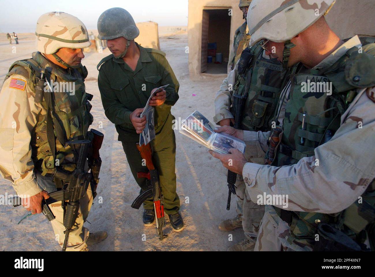 US soldiers Master Sgt. Generali, left, Sgt. Laws right, from the 720 ...