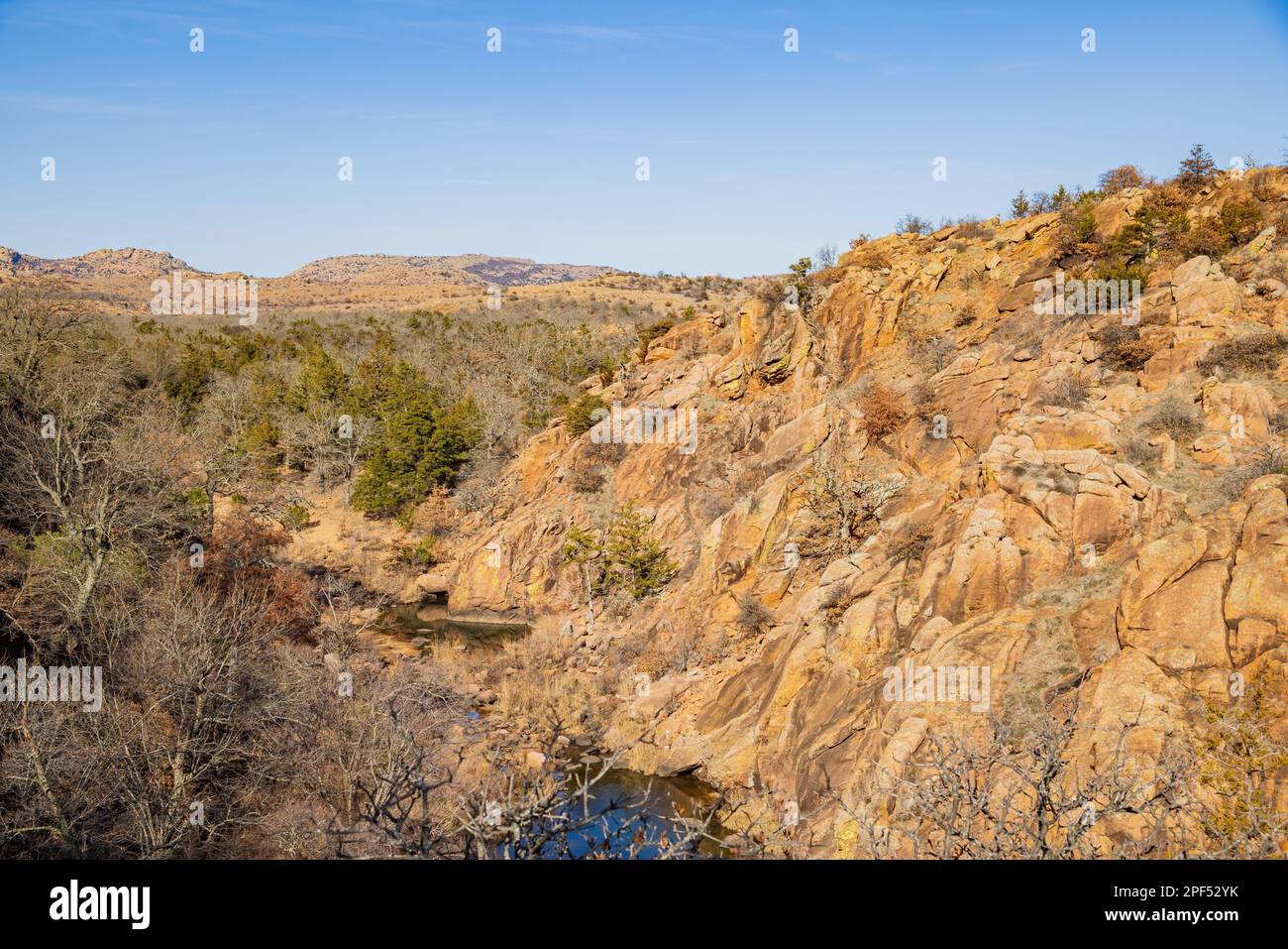 Sunny view of hiking in the Narrows Trail of Wichita Mountains National ...