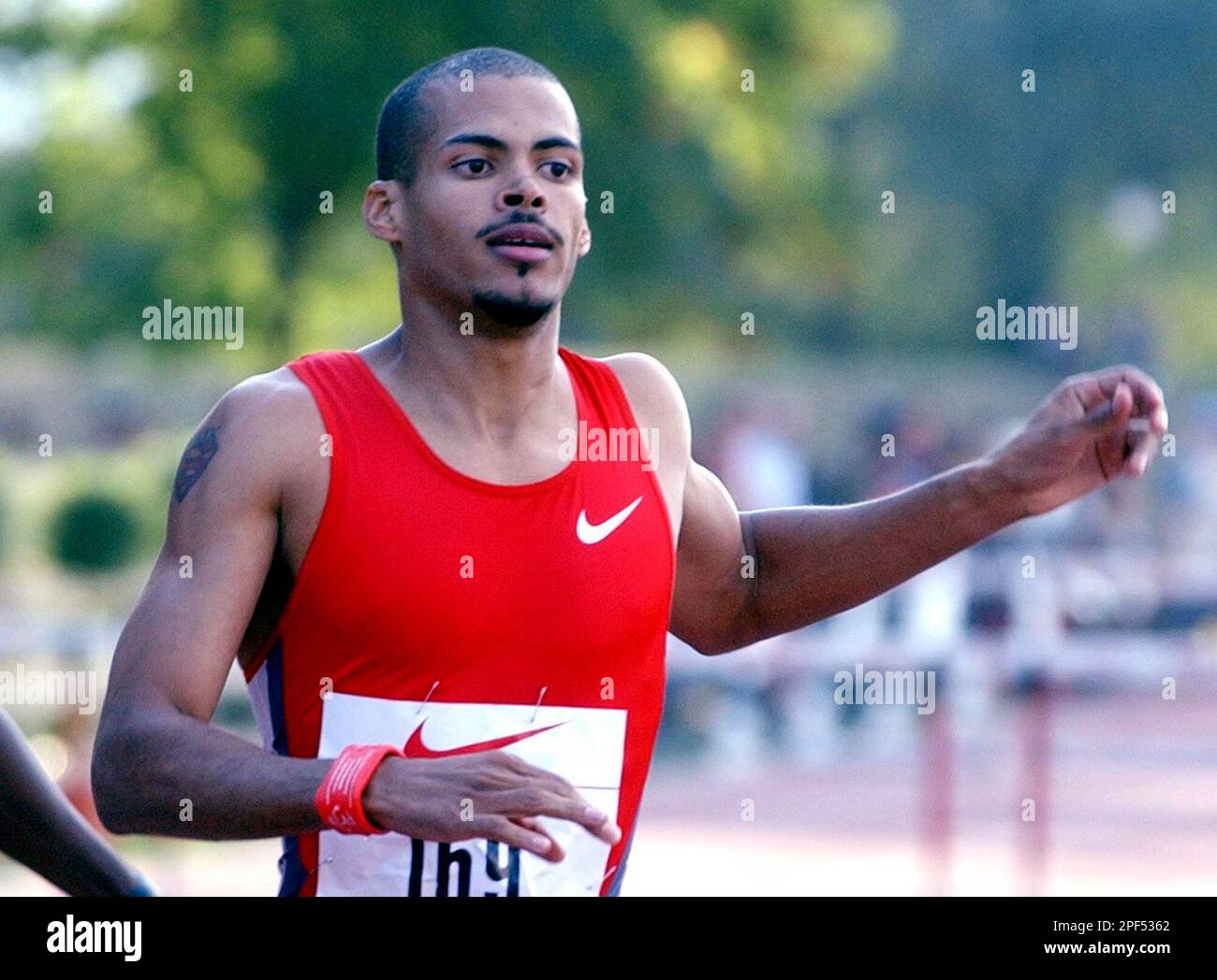 Sanchez Felix of the Dominican Republic crosses the finish line to win ...