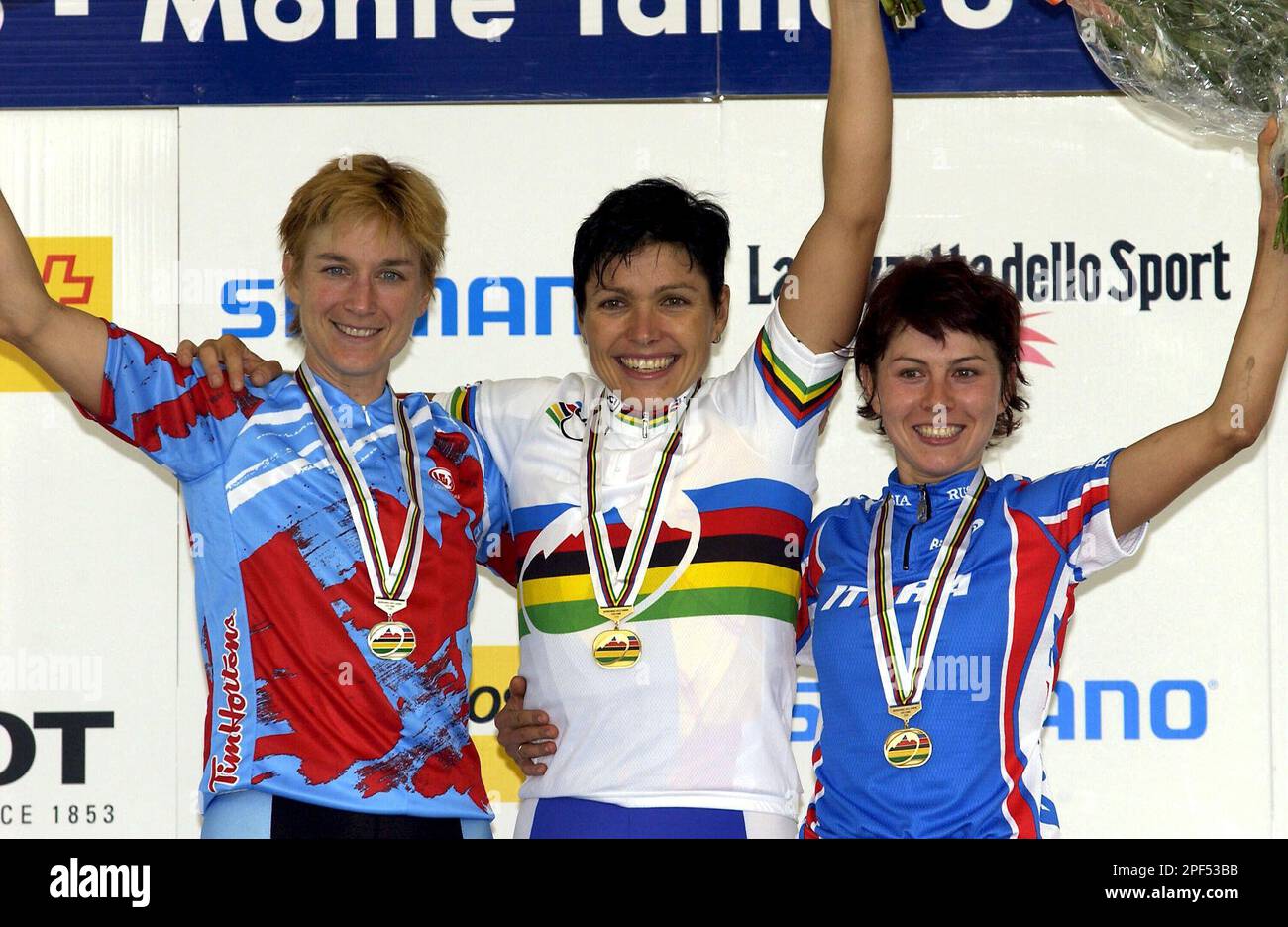 Winner and World Champion Sabine Spitz from Germany, center, is flanked ...