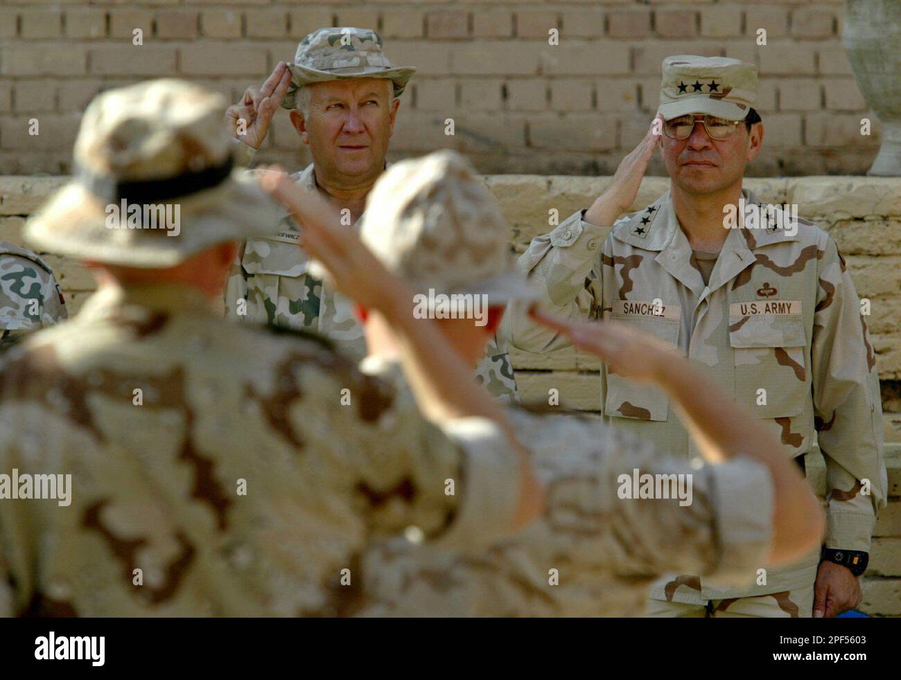 U.S. Lt. Gen. Ricardo Sanchez, right, and Polish Maj. Gen. Andrzej ...