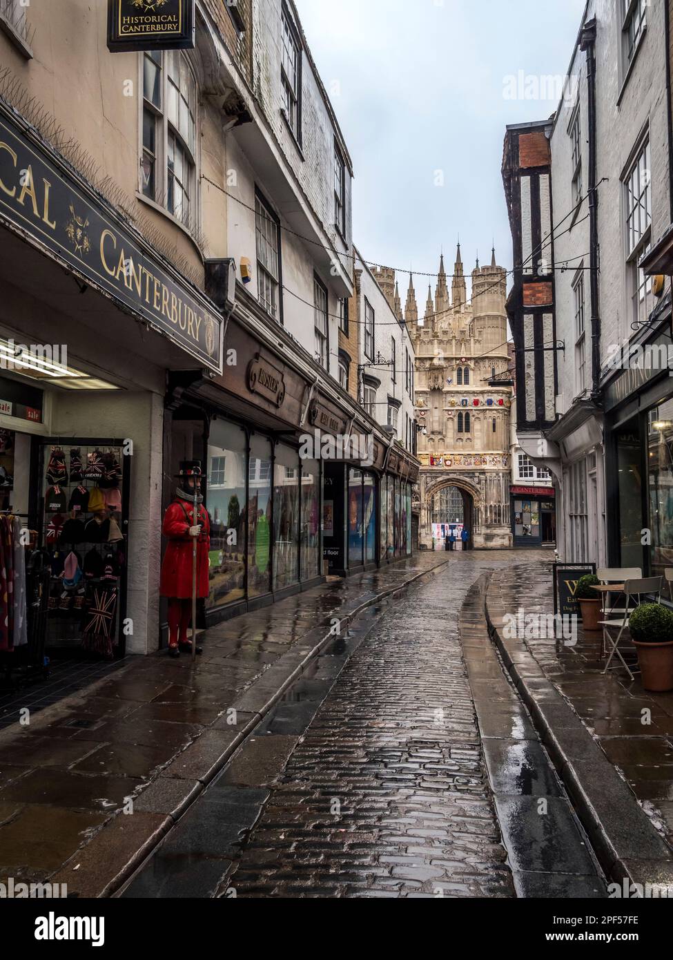 This street scene image of various shops & alley ways leading to the ...