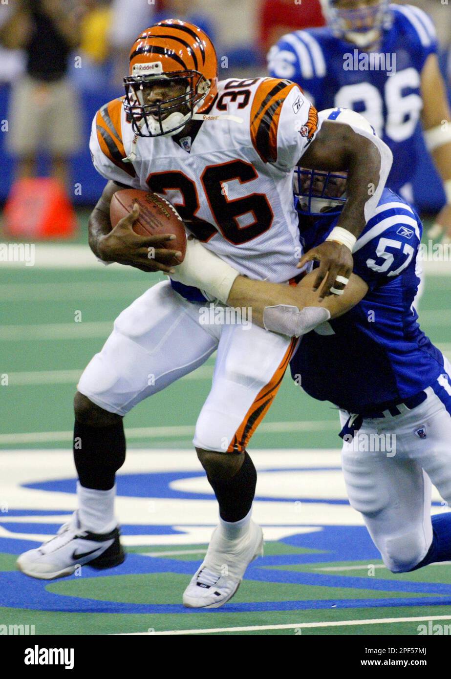 Cincinnati Bengals running back Brandon Bennett is tackled by Indianapolis Colts linebacker Jeff ...