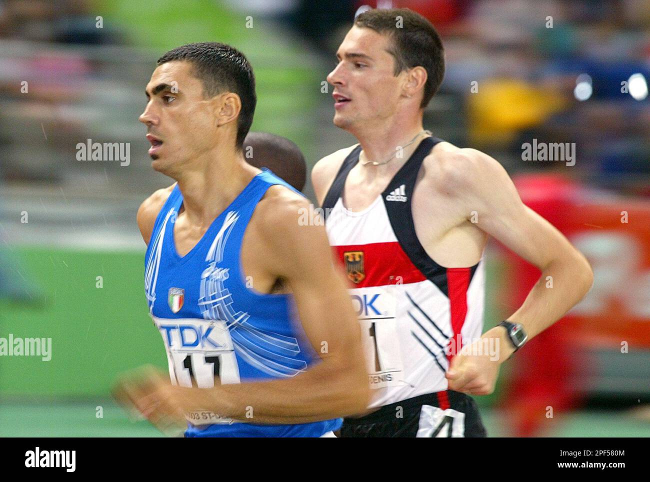 Andrea Longo of Italy, left, and Rene Herms of Germany compete in their ...