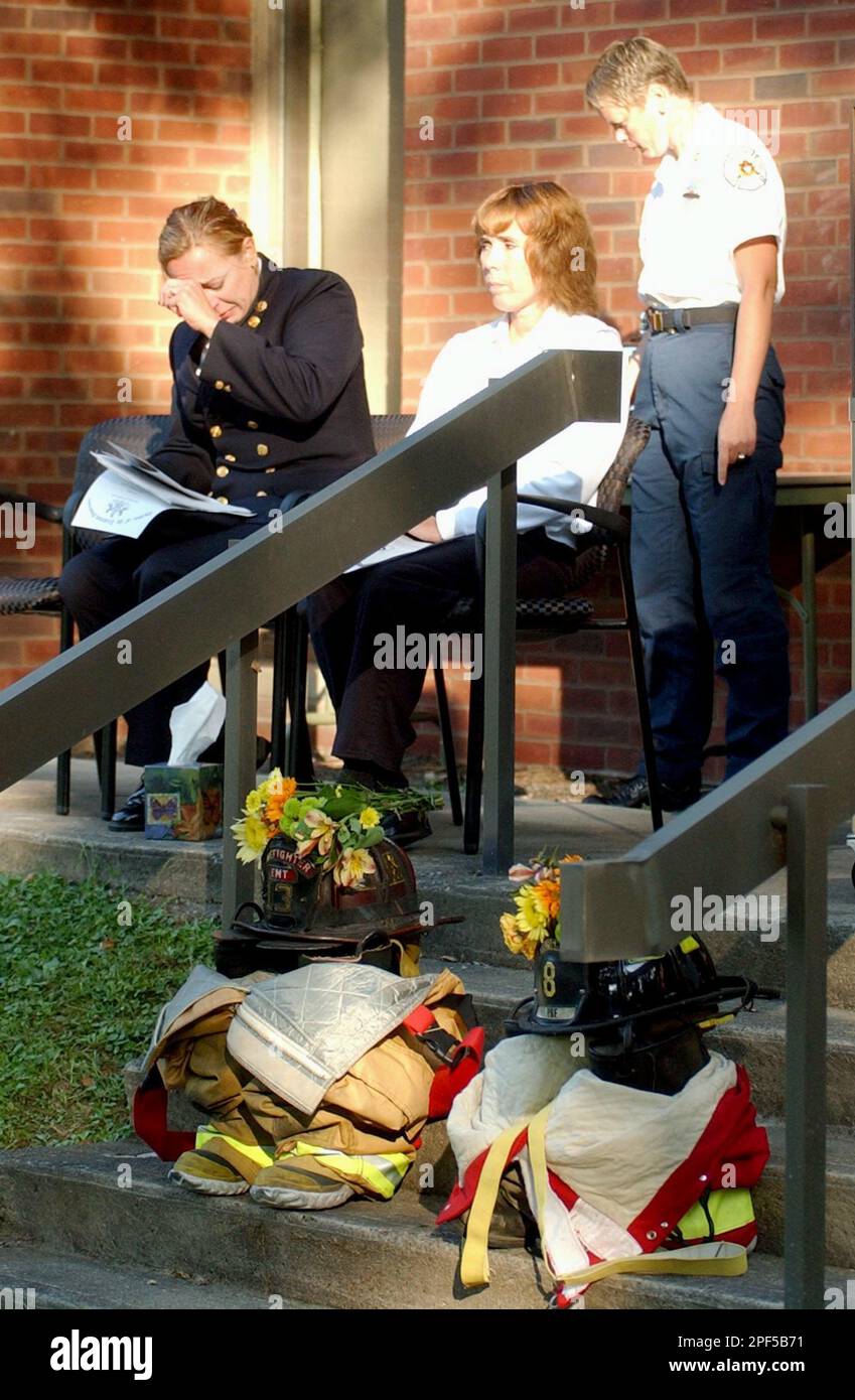 Capt. Jenny Hetrick, right, of the Brooklyn Hose Company sounds the ...