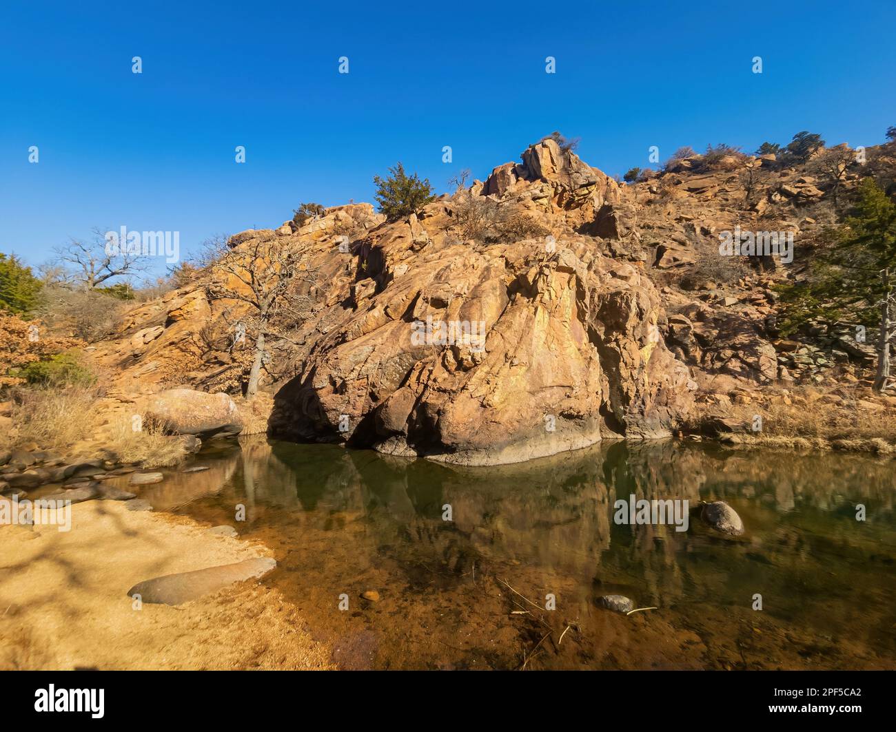 Sunny view of hiking in the Narrows Trail of Wichita Mountains National ...