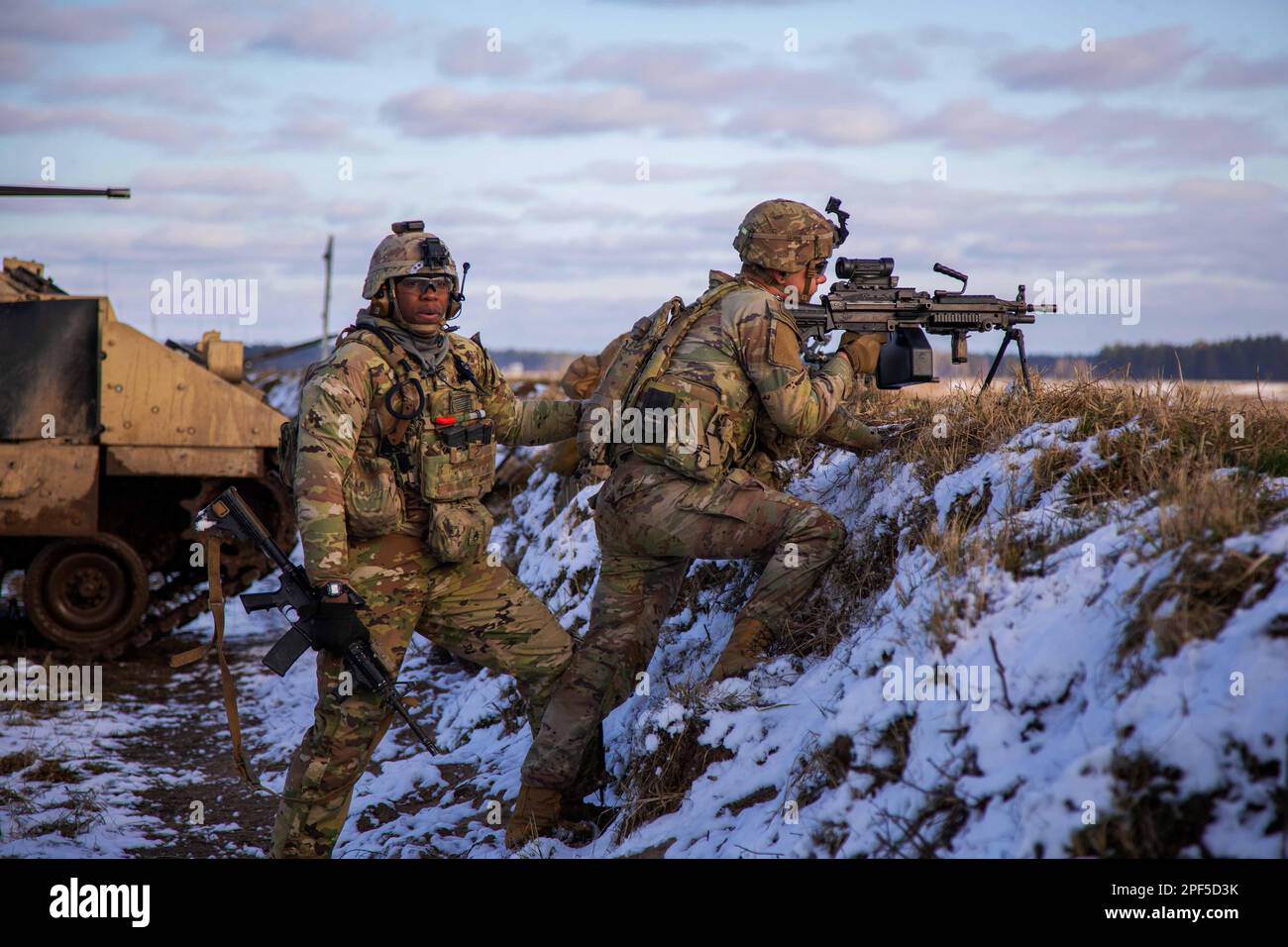 U.S. Army Staff Sgt. Ramaud M. Pugh, left, an infantry squad leader and ...