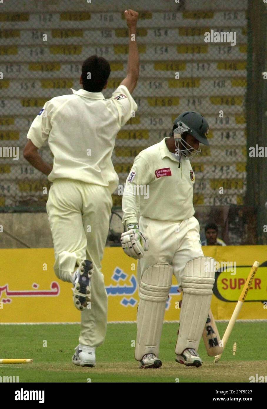 Pakistan fast bowler Umer Gul celebrate the dismissal of Bangladesh ...