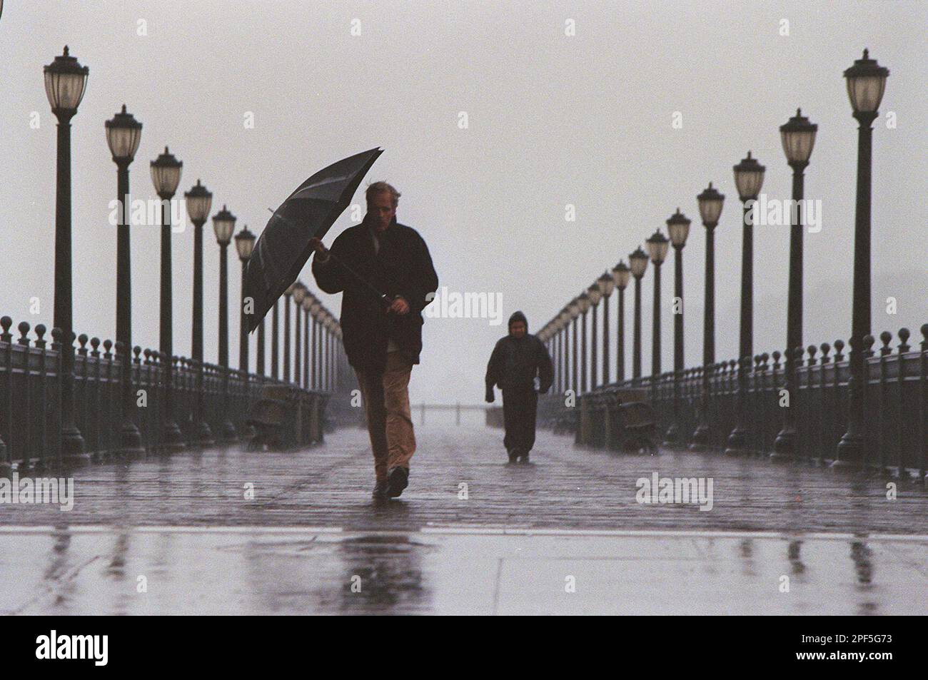 FEATURE 1/C/07DEC97/CD/LS ---- Peter Clyde, of San Francisco, protects ...