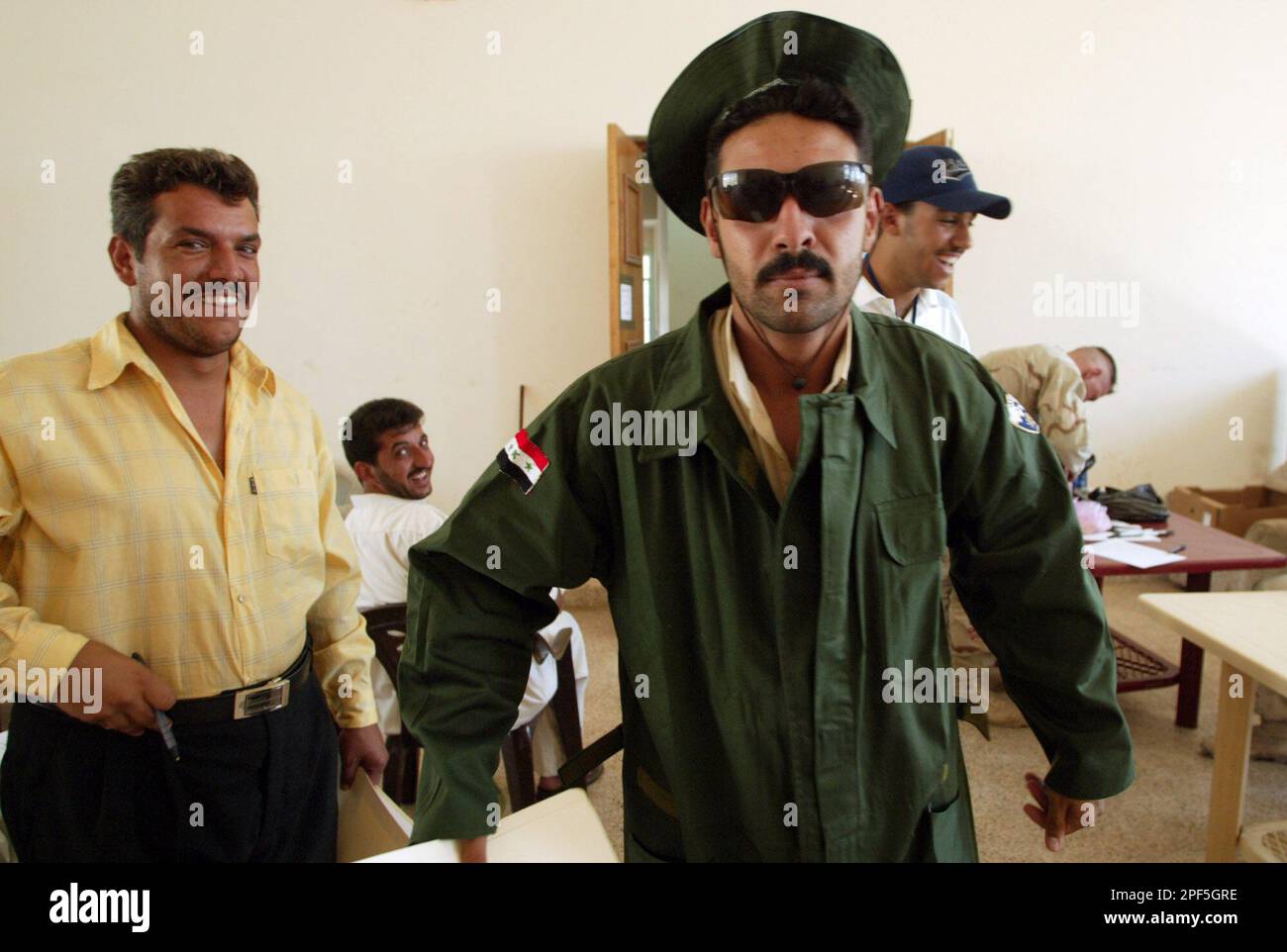 Amer Saleh Abdullah, a 22-year old Iraqi militia recruit, strikes a ...