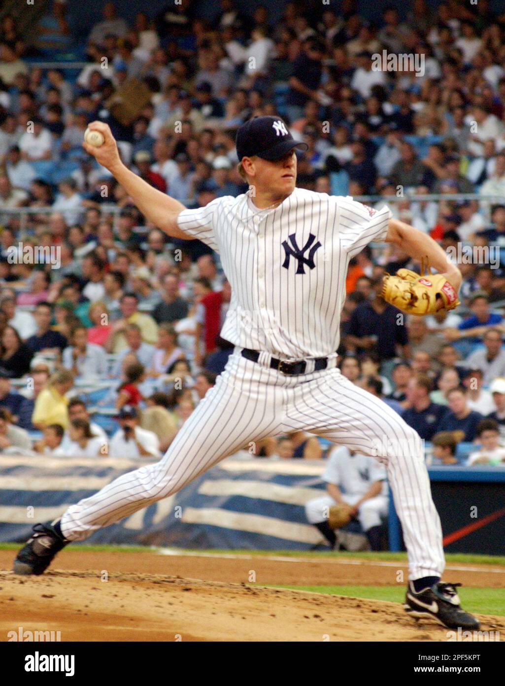 New York Yankees starting pitcher Jeff Weaver delivers to the Seattle ...