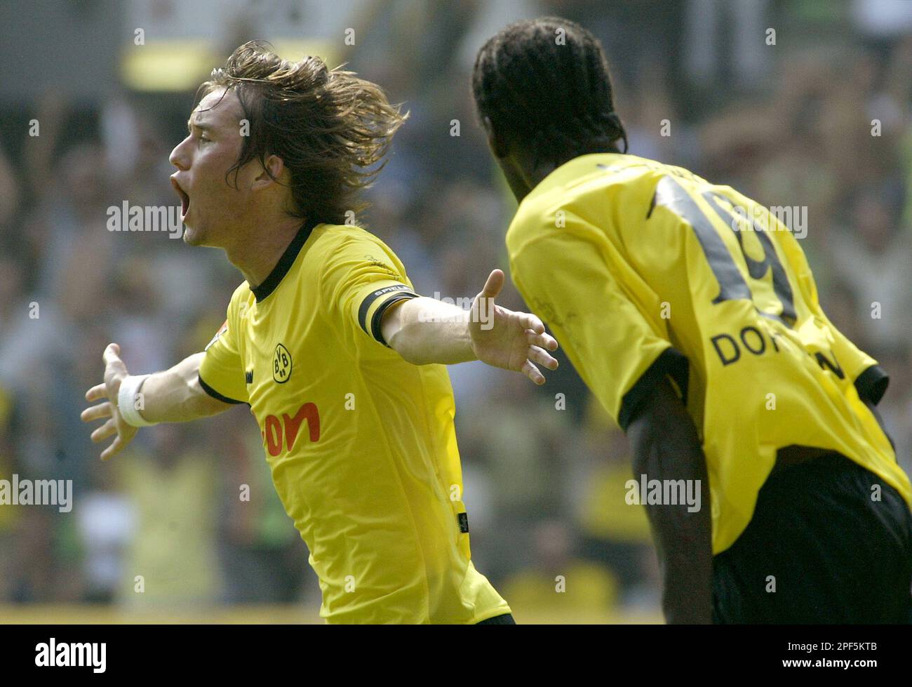Dortmund`s Czech player Tomas Rosicky, left, celebrate his 1-0 goal ...