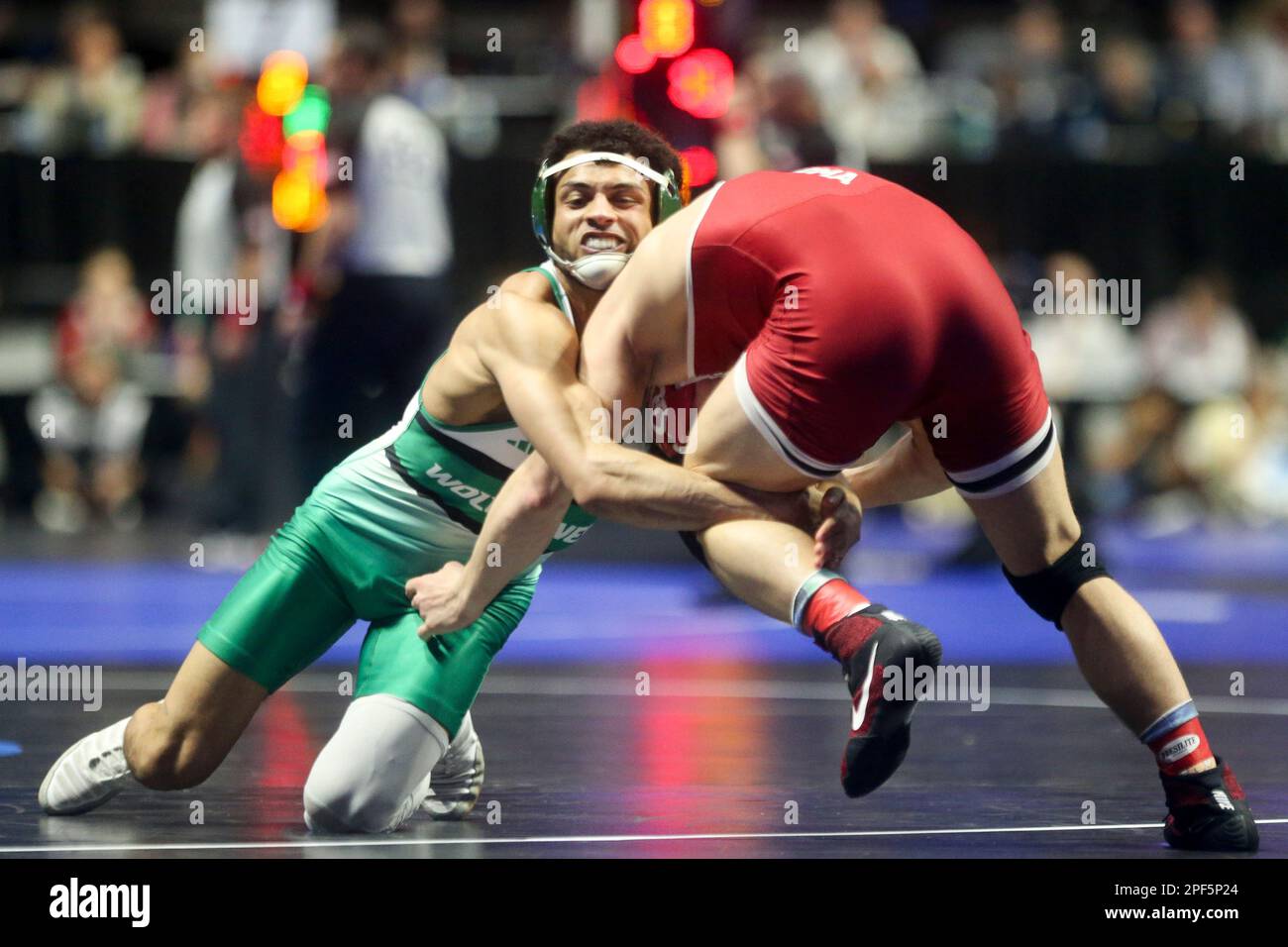 Utah Valley's Demetrius Romero takes down Oklahoma's Tate Picklo during ...
