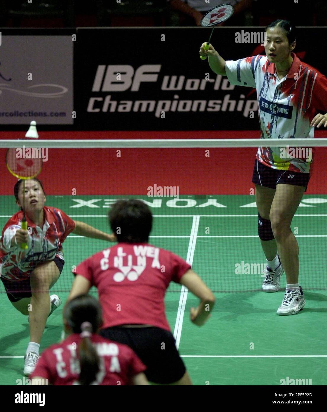 China's Gao Ling, left and Huang Sui in action against China's Wei Yili ...