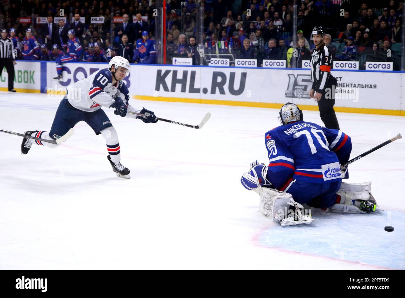 SKA Hockey Club player, Dmitry Nikolayev (No.70) and Torpedo Hockey ...