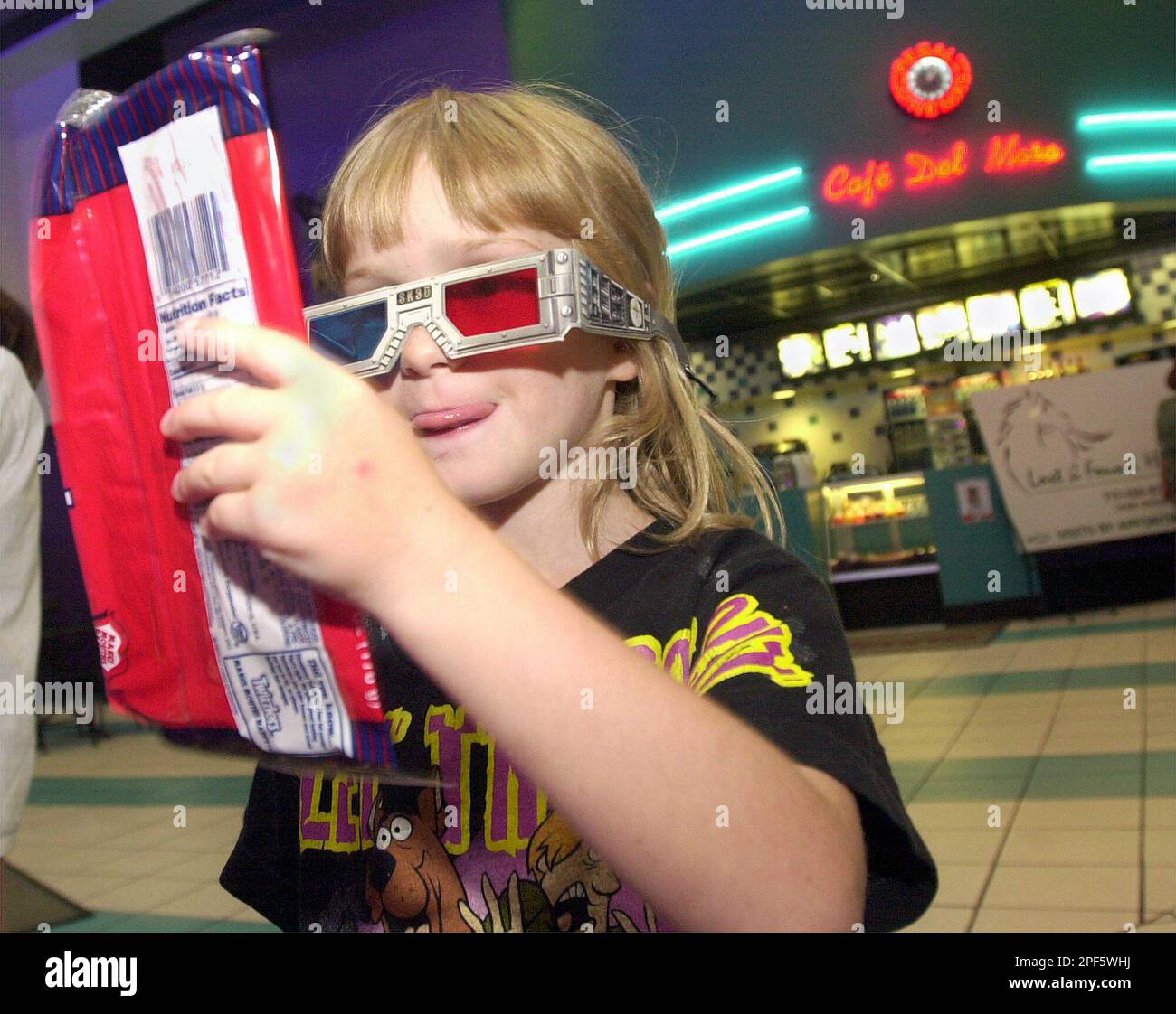 Nancy Hazelette, 5, of Felton, Pa., looks to see if her 3-D glasses ...