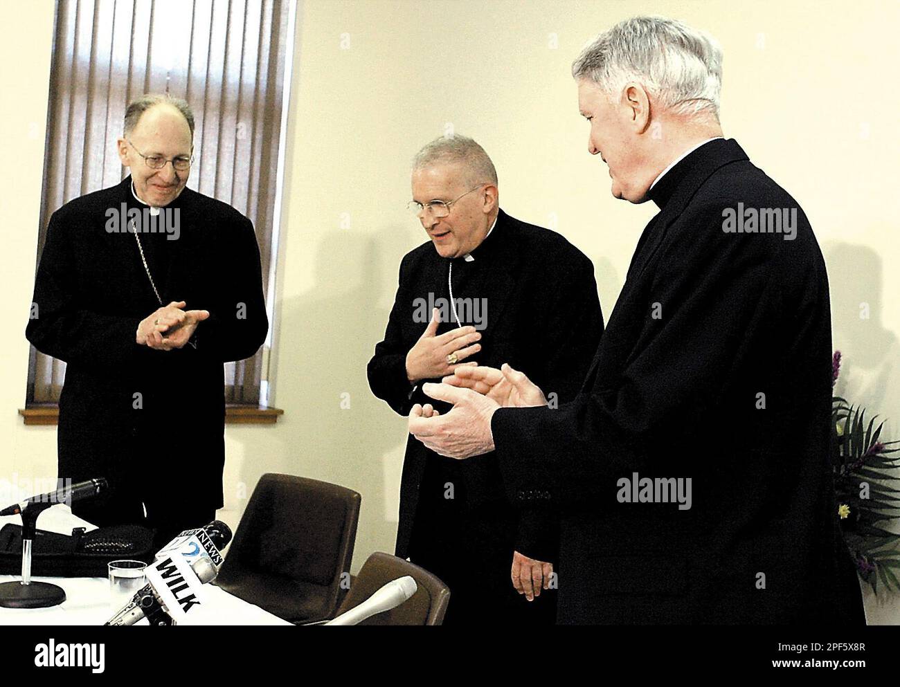 New Scranton Bishop Joseph F. Martino, center, is introduced by ...