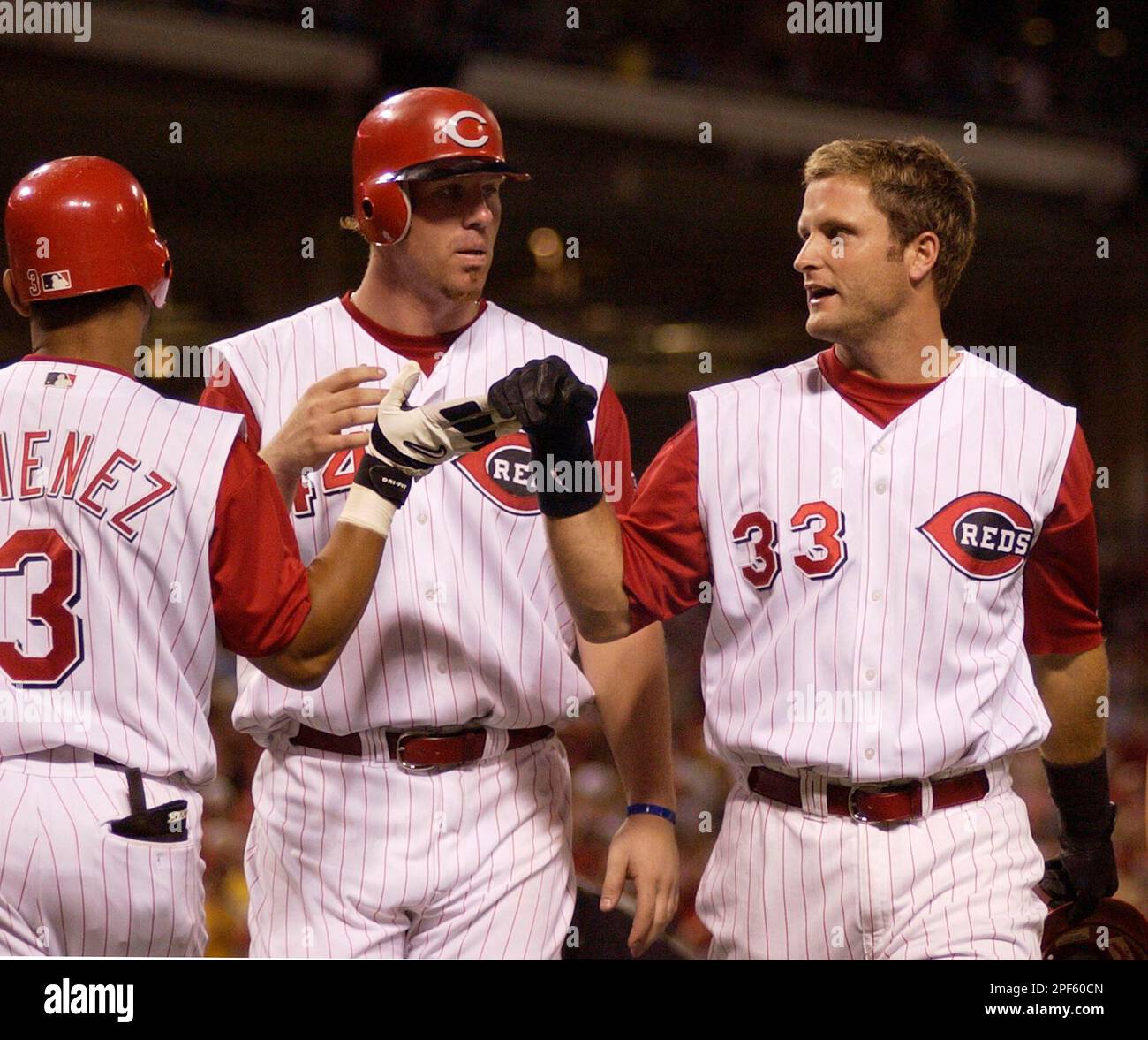 Cincinnati Reds' Russell Branyan (33) is congratulated by D'Angelo ...