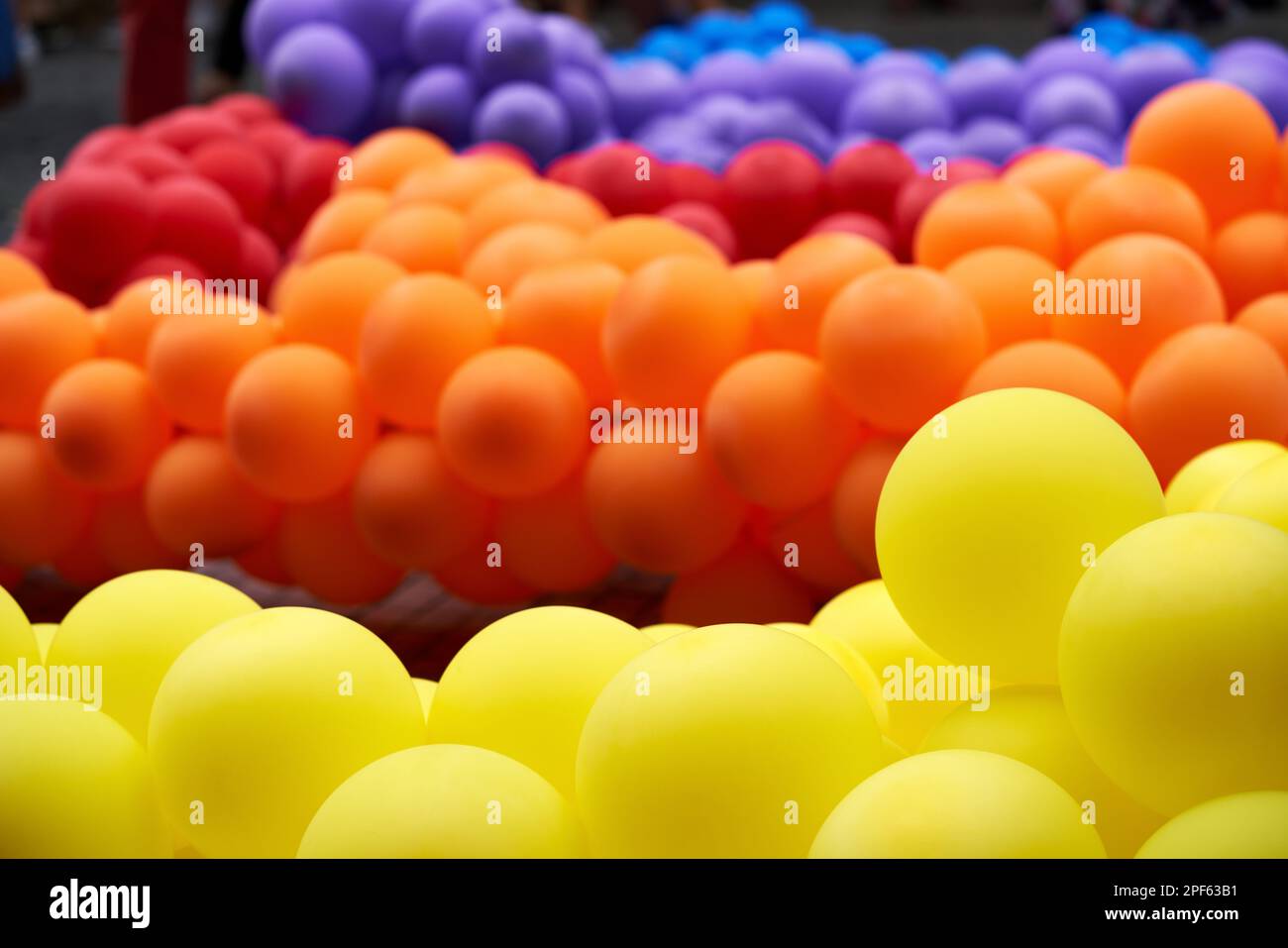 Colorful balloons in the street during LGBT pride Stock Photo - Alamy