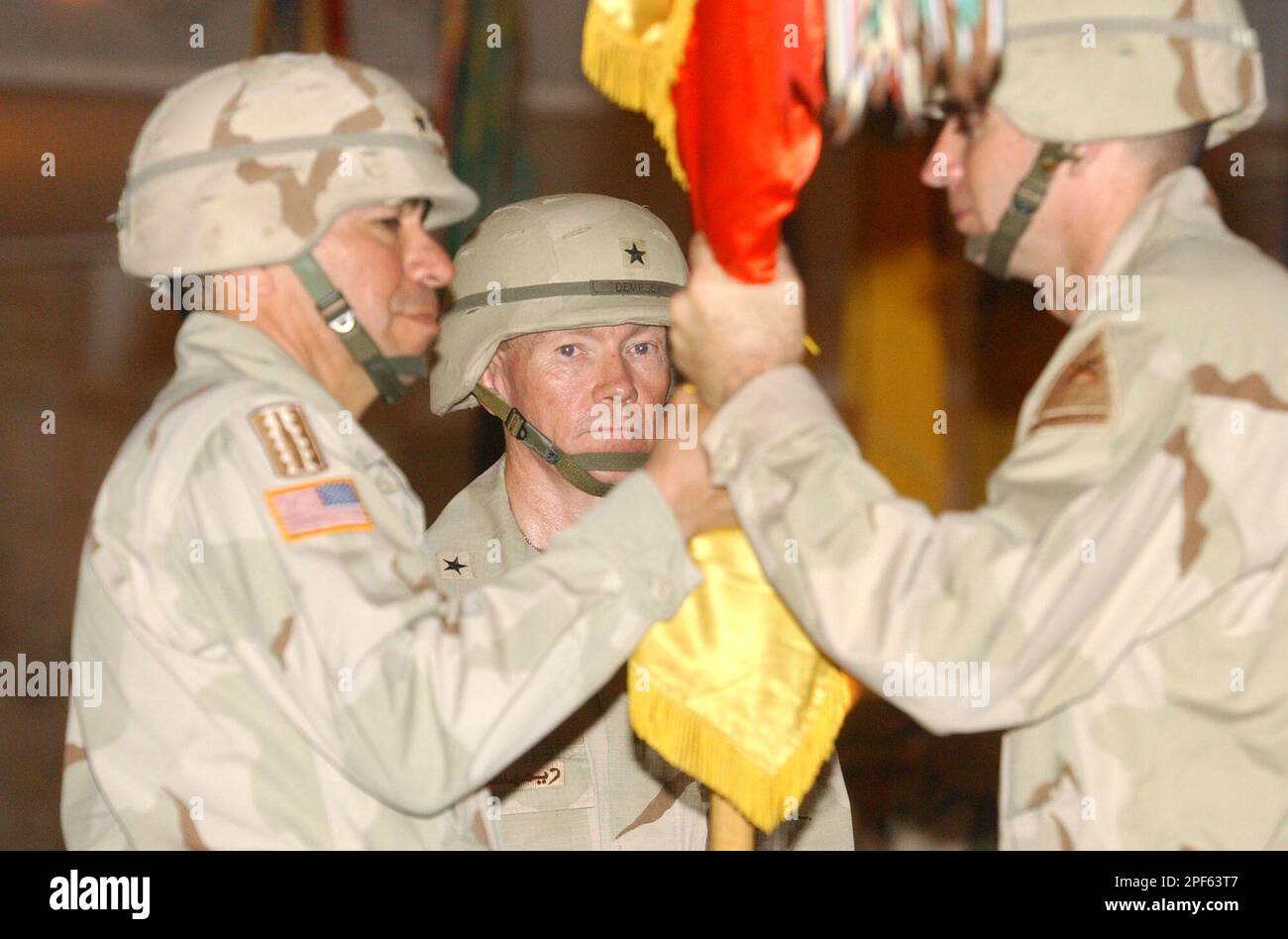 Incoming U.S. Army Brig. Gen. Martin E. Dempsey center, watches ...