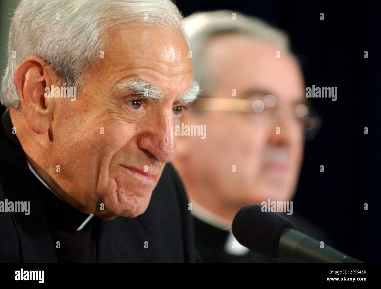Cardinal Anthony J. Bevilacqua listens to a reporter's question as St ...