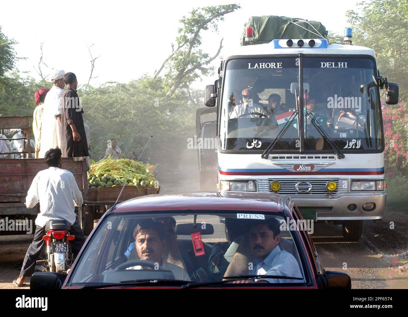 A Delhi-bound passenger bus makes its way to Wagah border post near ...