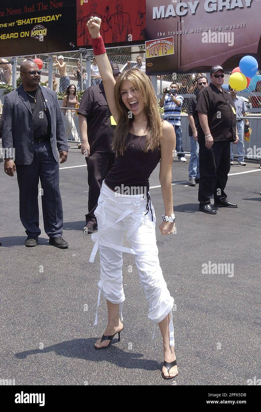 Mexican superstar Thalia greets fans as she arrives to present her new ...