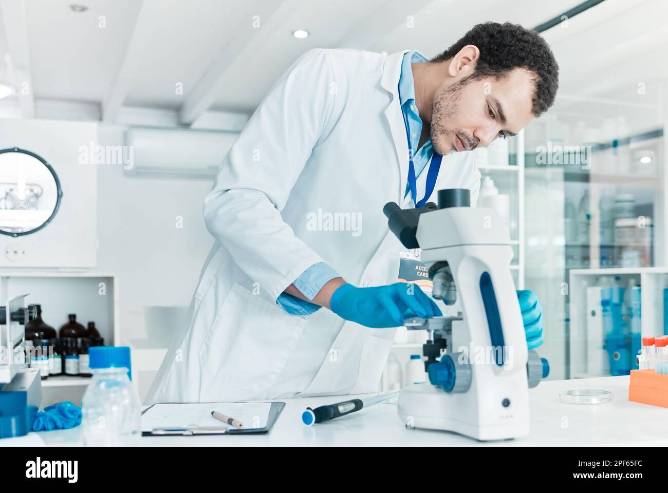Scientist using microscope in lab hi-res stock photography and images ...