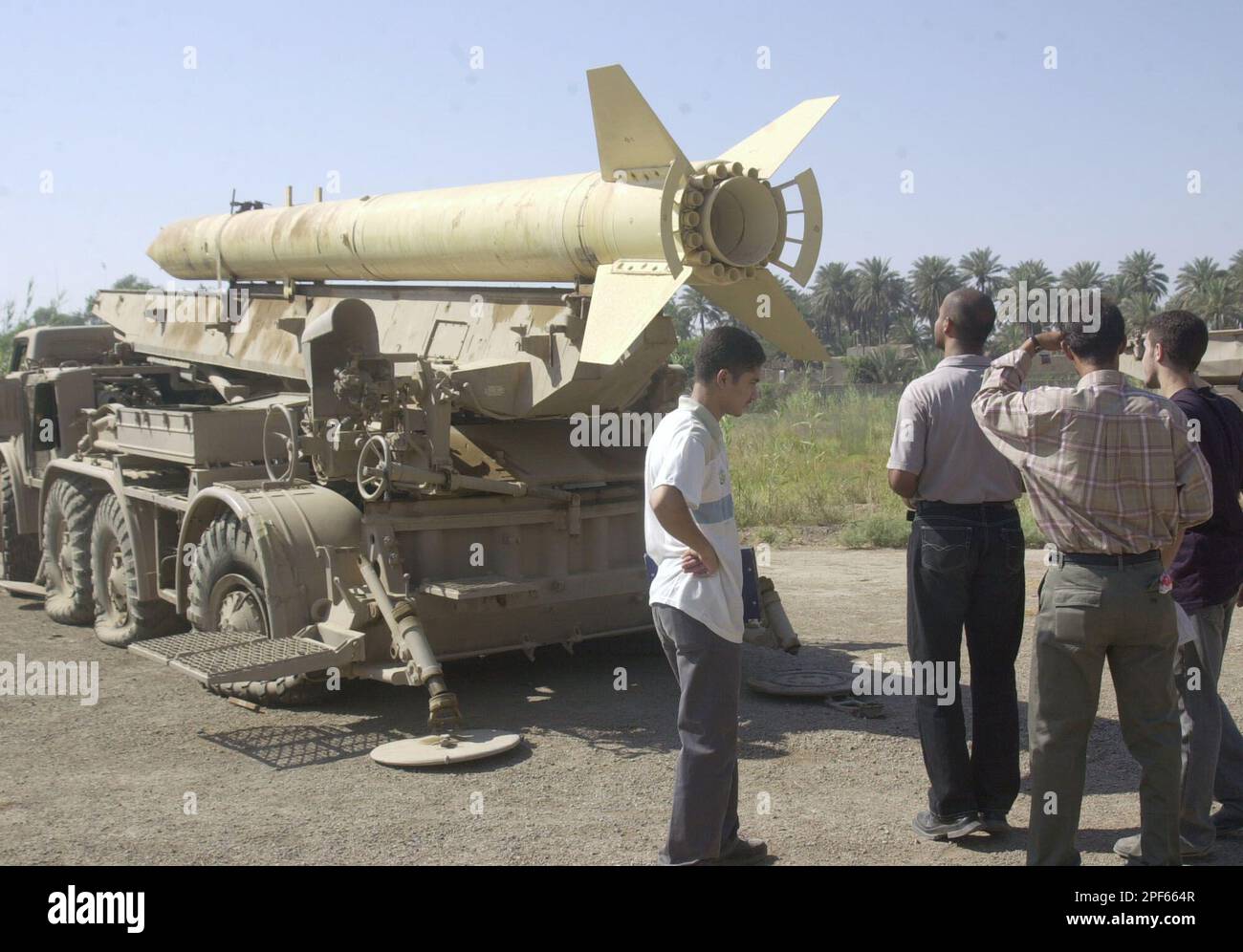 Students gather at an abandoned surface-to-surface missile inside the ...