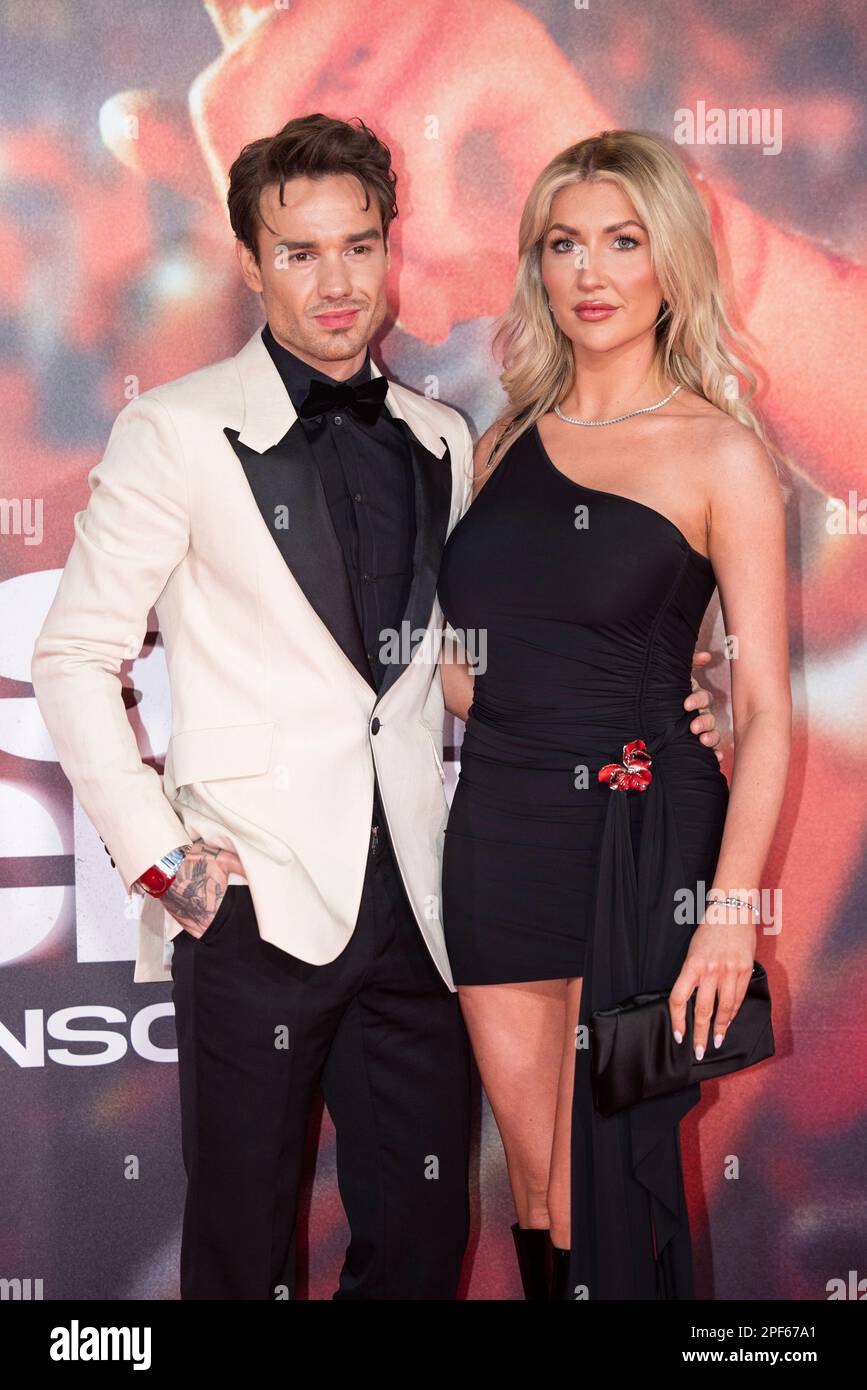 Liam Payne, left, and Kate Cassidy pose for photographers upon arrival ...