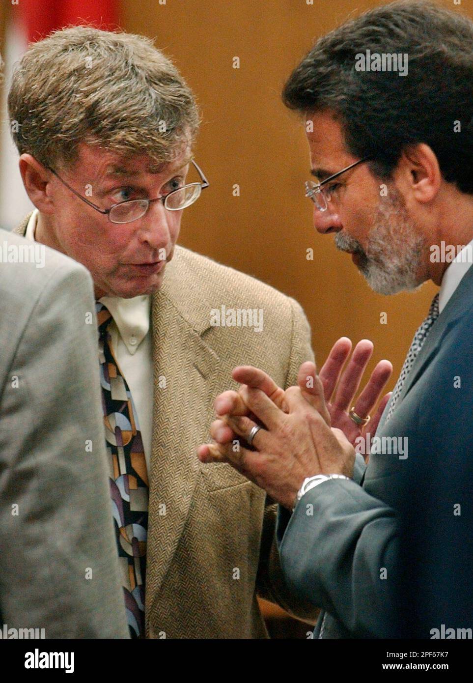 Mike Peterson, left, speaks with his attorney David Rudolf during a ...