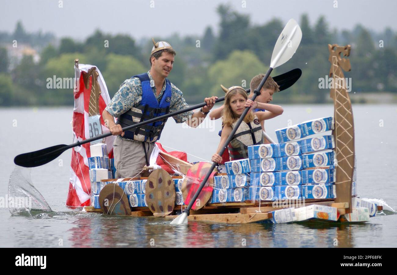Andy Dym, left, with his children Rachel, 13, and Isaac, 10, paddle ...