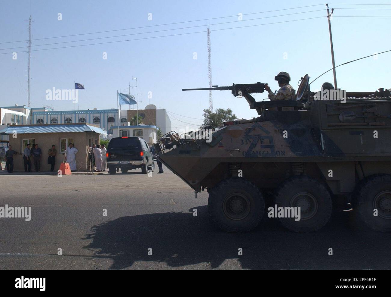 A US trooper on an armored personnel carrier guards the UN office in ...