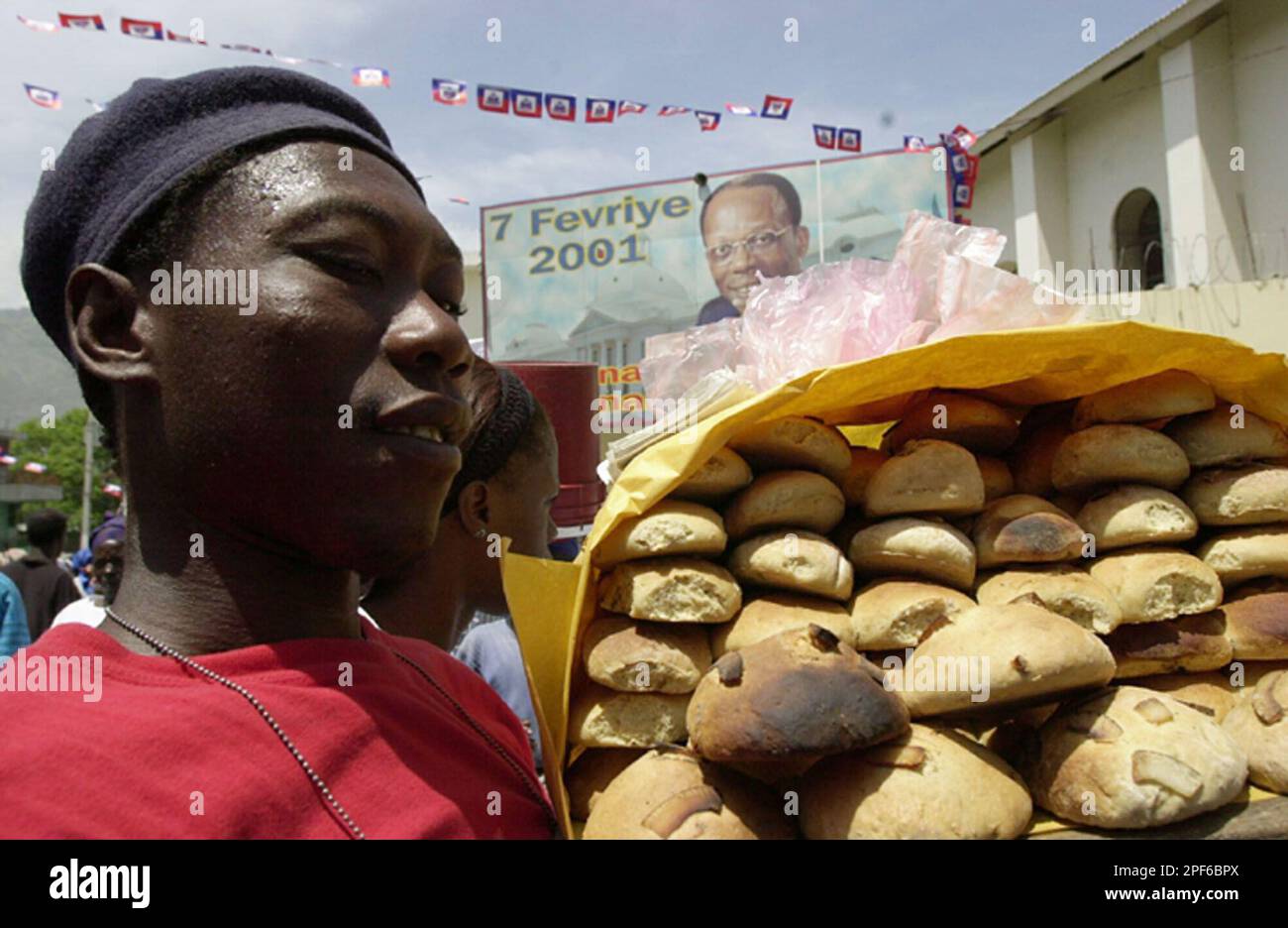 Bernard Pierre sells konparet, a famous almond-flavored cake from ...