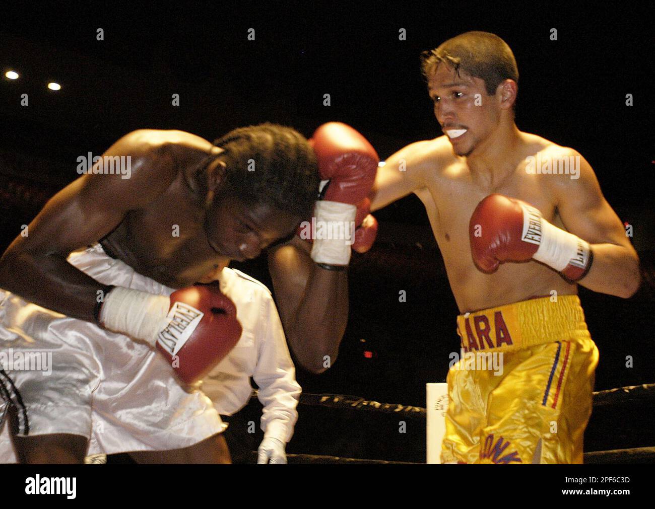 Octavio Lara, right, of Detroit connects with Randy Dobbs of Cincinnati ...