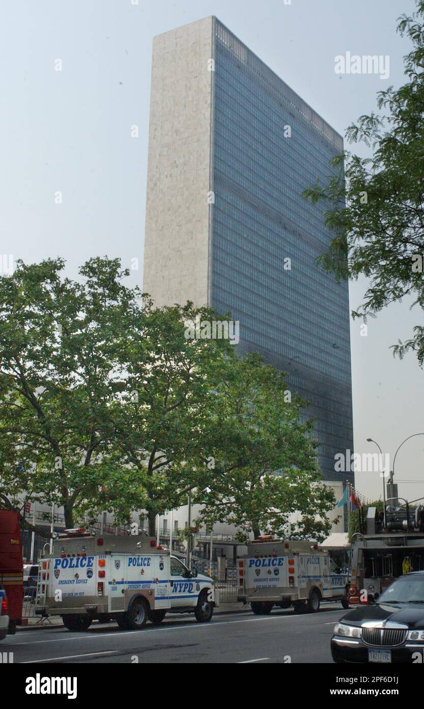 New York police and fire vehicles surround the United Nations buildings ...
